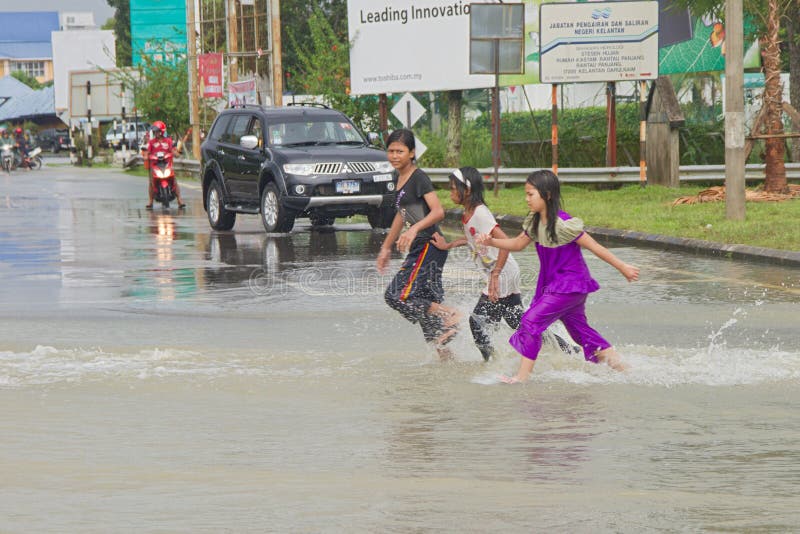 Having Fun in Flood Water editorial photography. Image of november ...
