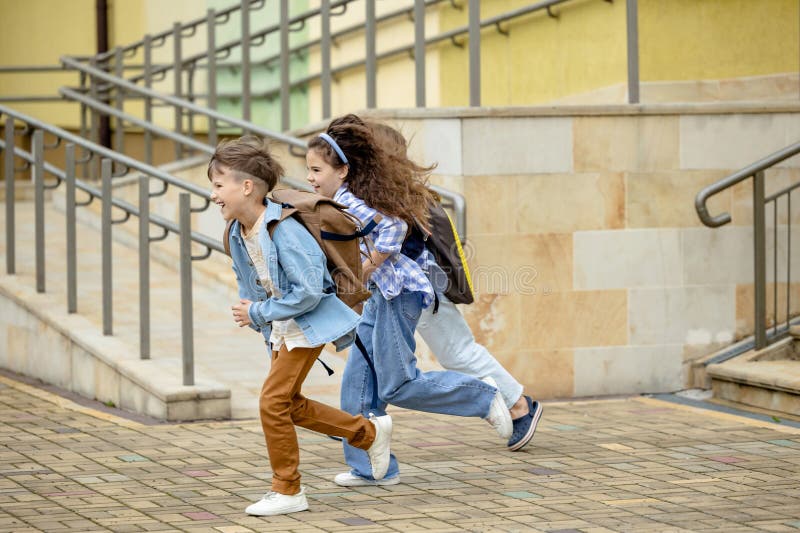 Kids Getting Out of the School after the Lessons Stock Image - Image of ...