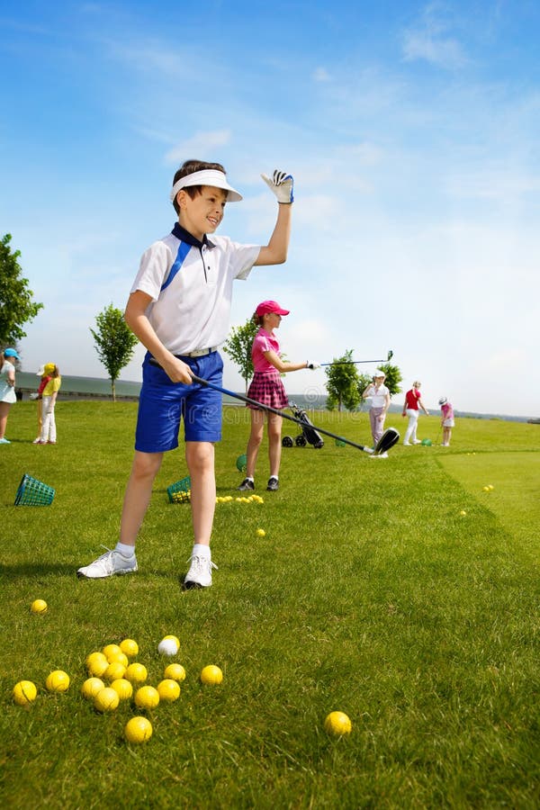 Kids playing golf stock photo. Image of ball, caucasian - 67047352
