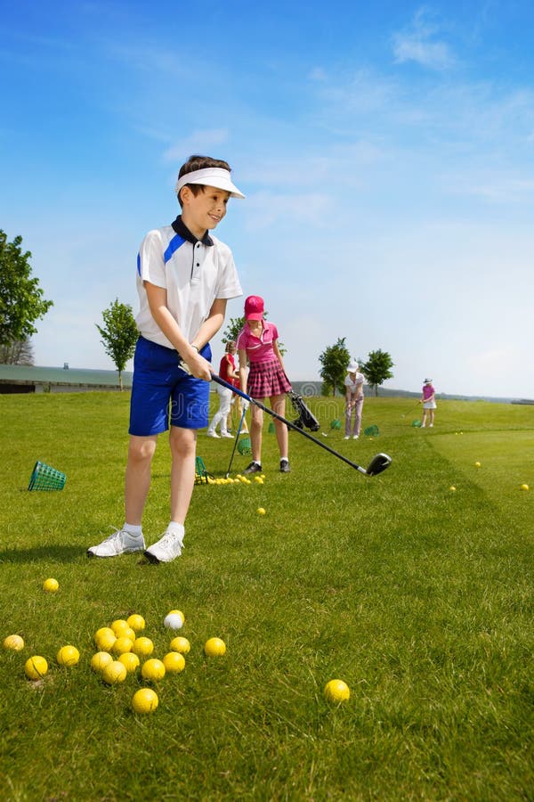 Kids playing golf stock photo. Image of outdoors, hobby - 68619724