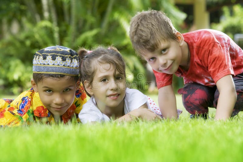 Kids on grass stock image. Image of beautiful, black - 10892721