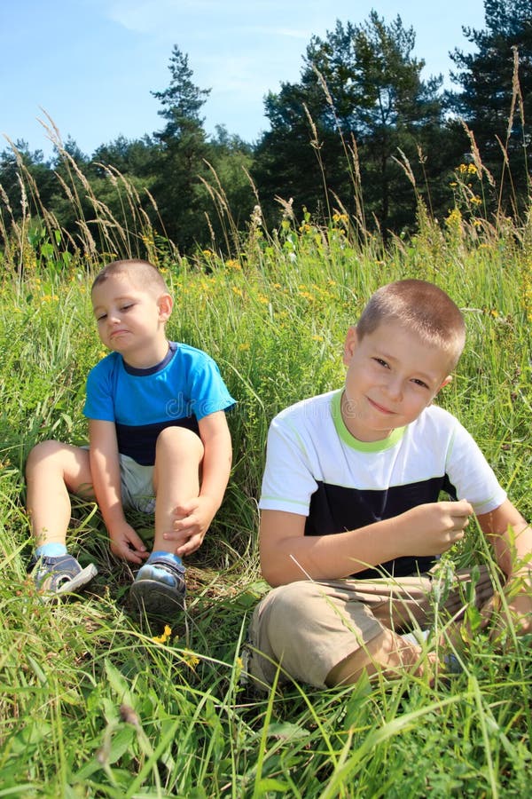 Kids in grass stock image. Image of summer, caucasian - 12113929