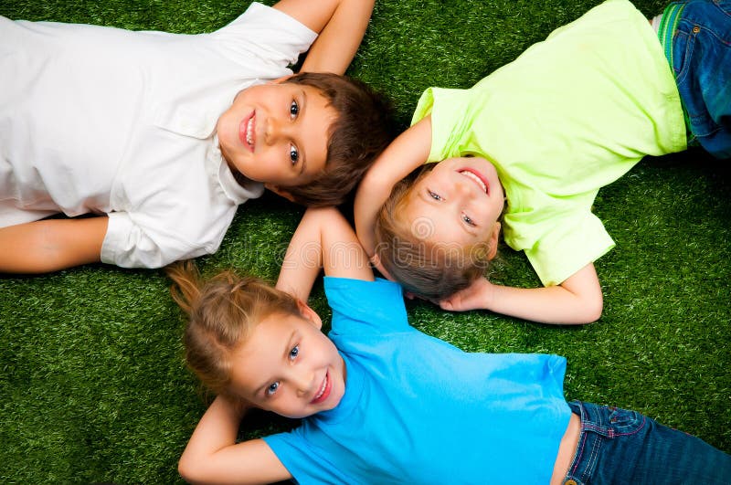 Kids on grass stock photo. Image of beautiful, child - 22214546