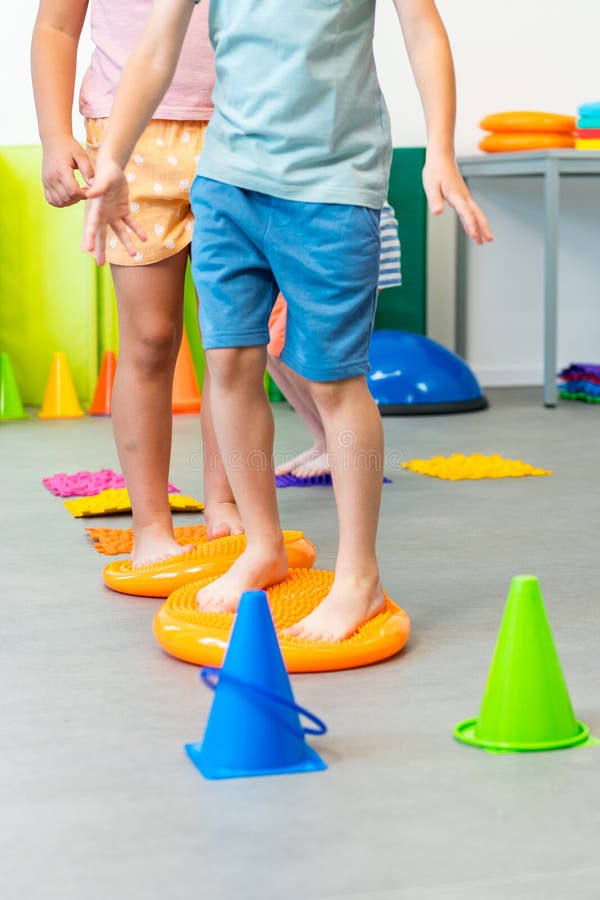 Kids Group Physio Therapy. Children Exercising during Physical Therapy ...