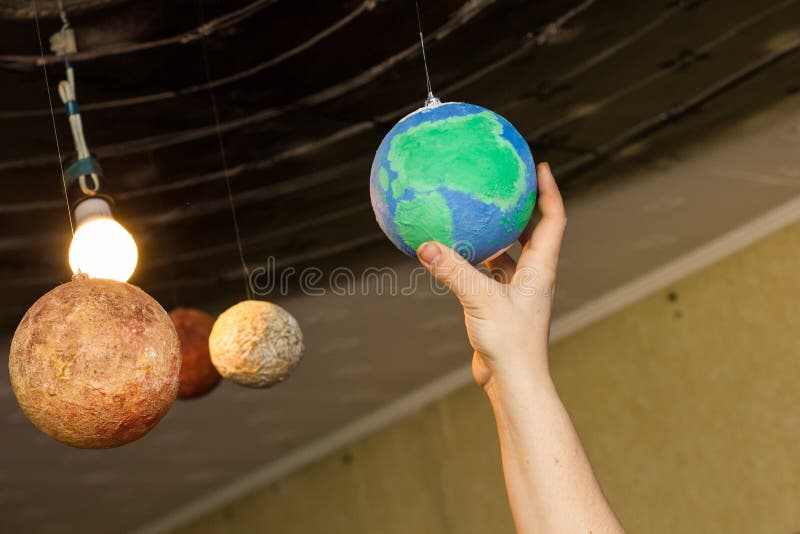 Kids Hands with the Planets of the Solar System Stock Image - Image of ...