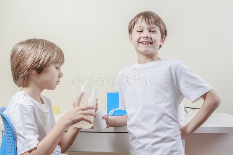 Kids Have Fun while Doing Science Experiments. Education Concept. Stock ...