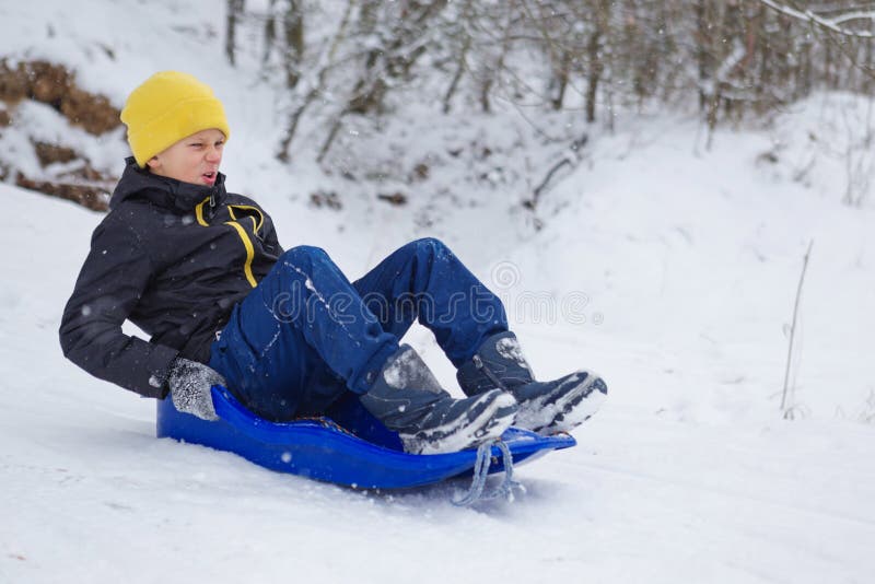 Kids Have Fun Sledding with Snow Slides Stock Photo - Image of people ...