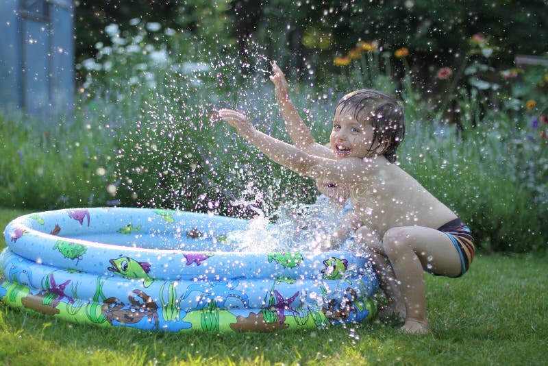 Kids having fun stock photo. Image of sibling, splash - 15734436