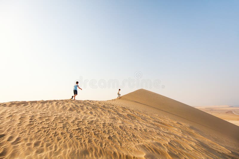 Kids having fun at desert stock photo. Image of happiness - 191457590