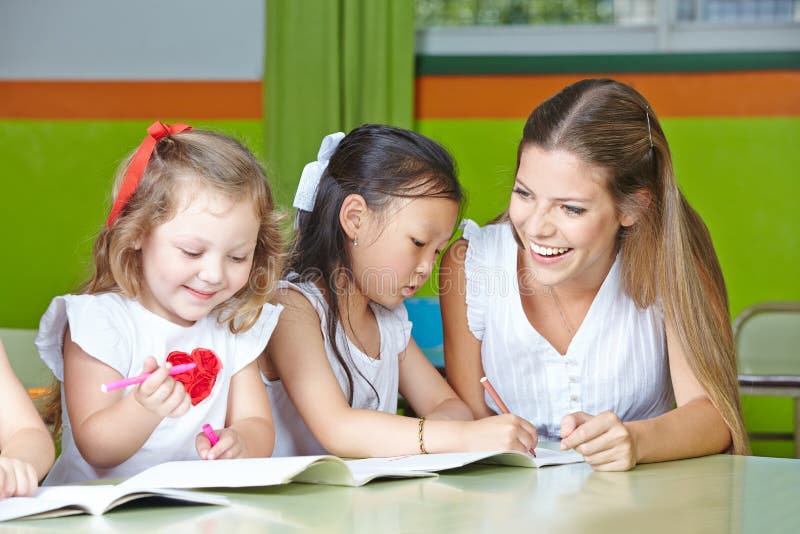 Kids having fun drawing stock image. Image of preschool - 40769903