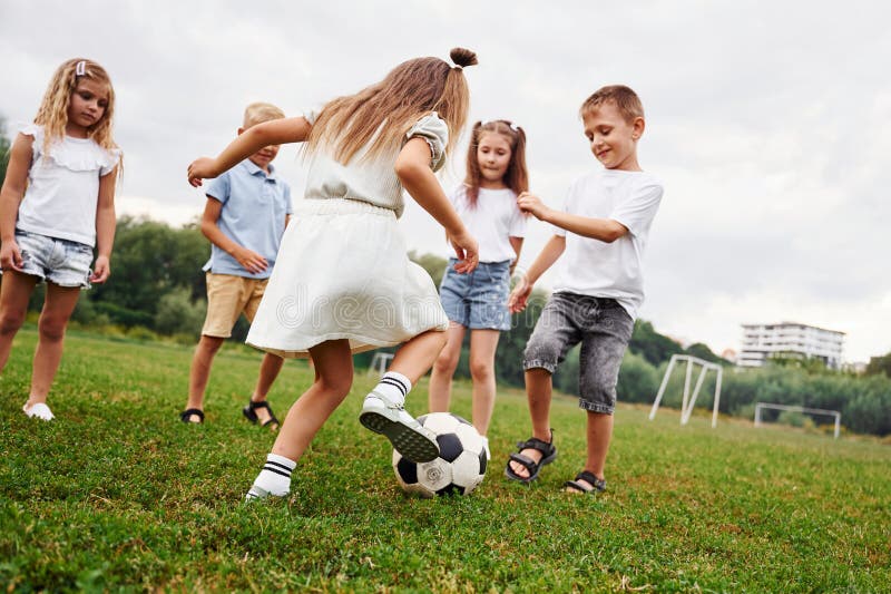 Holding the Rope, Playing Game. Kids are Having Fun on the Field at ...