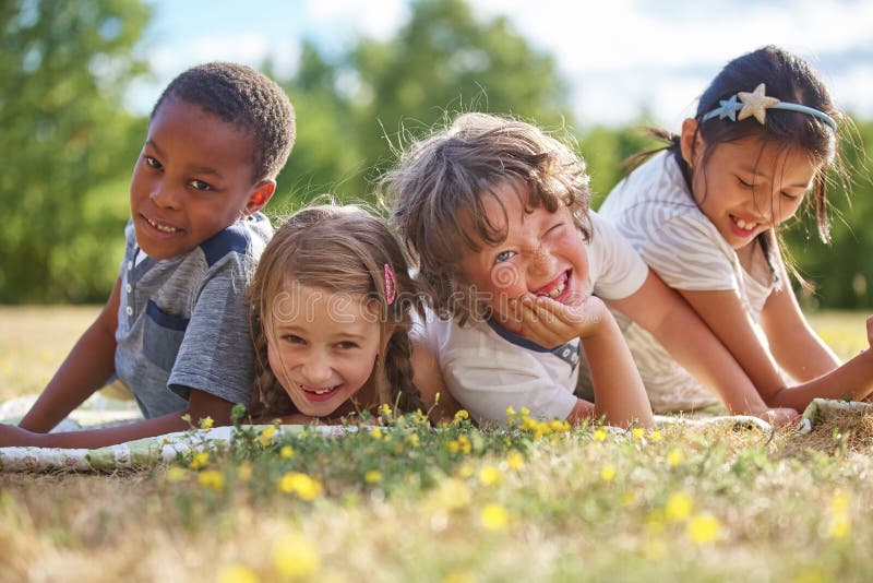 Kids having fun stock image. Image of childhood, meadow - 80635113