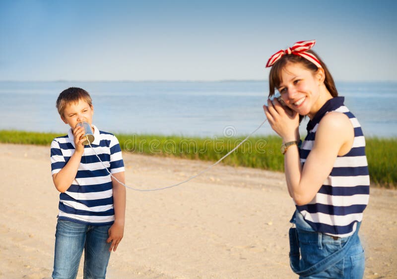 Kids Having a Phone Call with Tin Cans Stock Photo - Image of calls ...