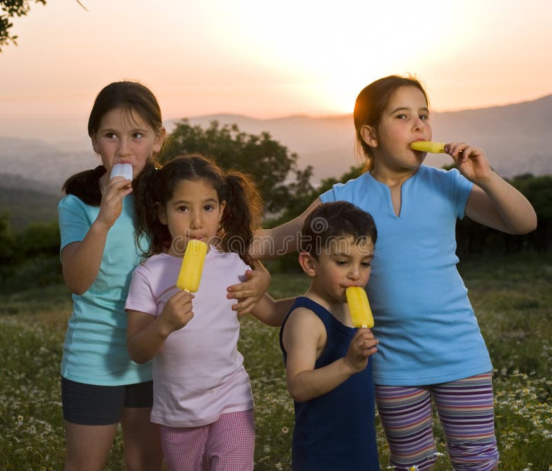 Kids having pop ice stock photo. Image of group, medium - 9301190