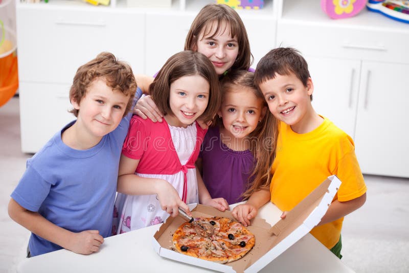 Kids at home with pizza stock photo. Image of lunch, cutting - 23597972