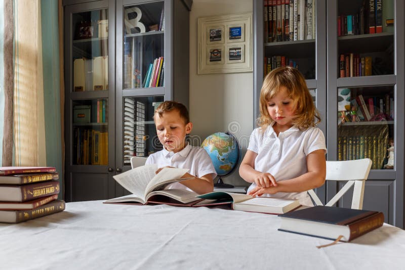 Kids at homework stock photo. Image of child, help, globe - 71798172