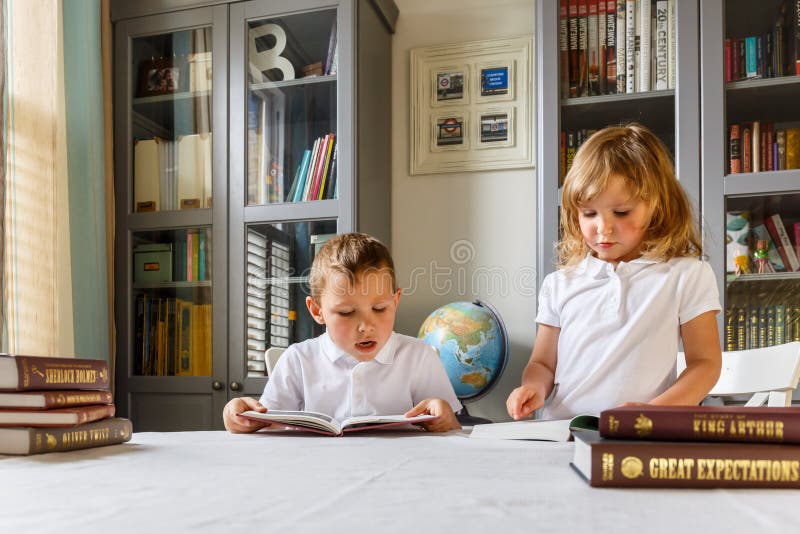 Kids at homework stock image. Image of kingdom, education - 71798173
