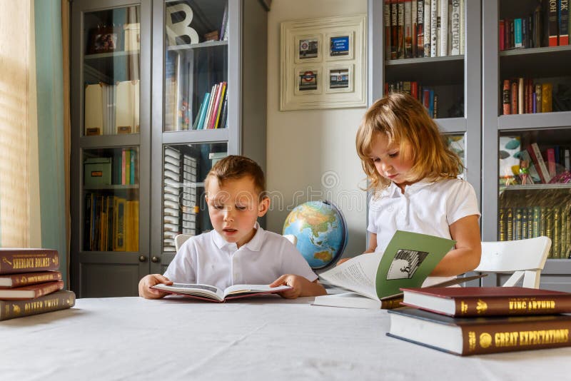 Kids at homework stock photo. Image of emotion, globe - 71798280