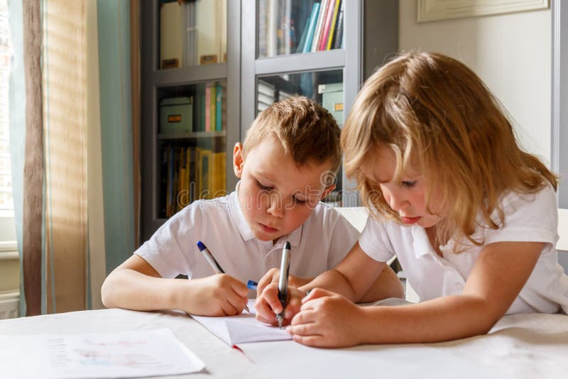 Kids at homework stock photo. Image of britain, kingdom - 71798574