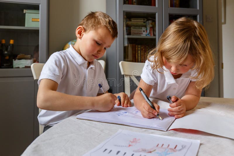 Kids at homework stock image. Image of great, england - 71799175
