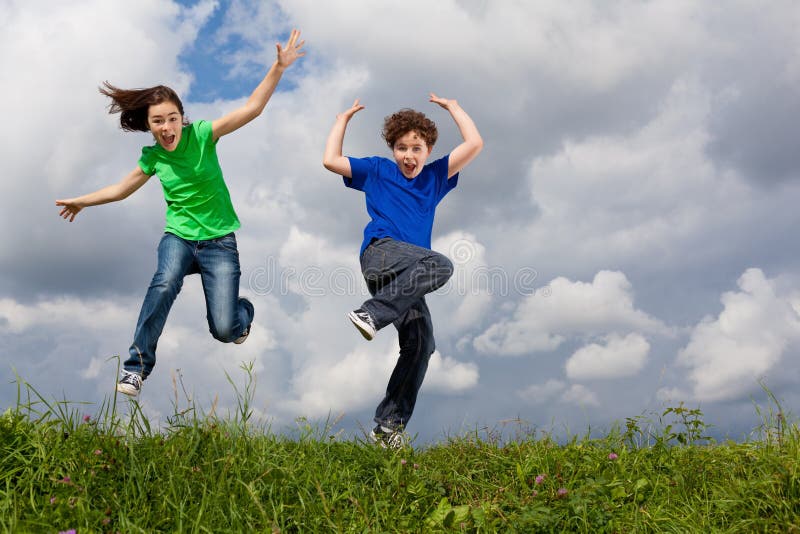 Kids Jumping Outdoor Royalty Free Stock Photography - Image: 16189637