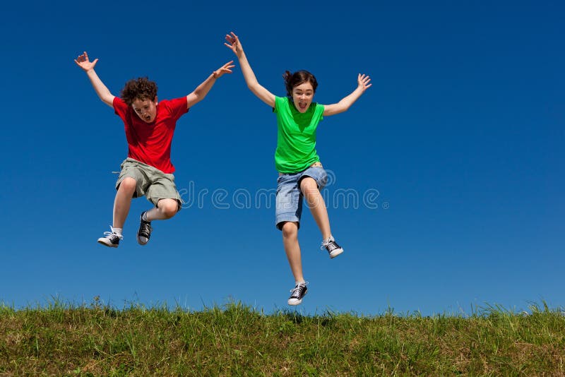 Kids jumping stock photo. Image of american, colorful - 15865430