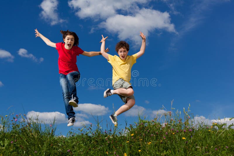 Kids jumping outdoor stock photo. Image of action, freedom - 16450530
