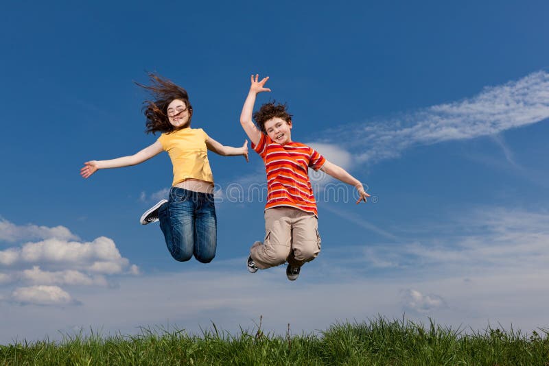 Kids jumping outdoor stock image. Image of leap, jump - 16450617