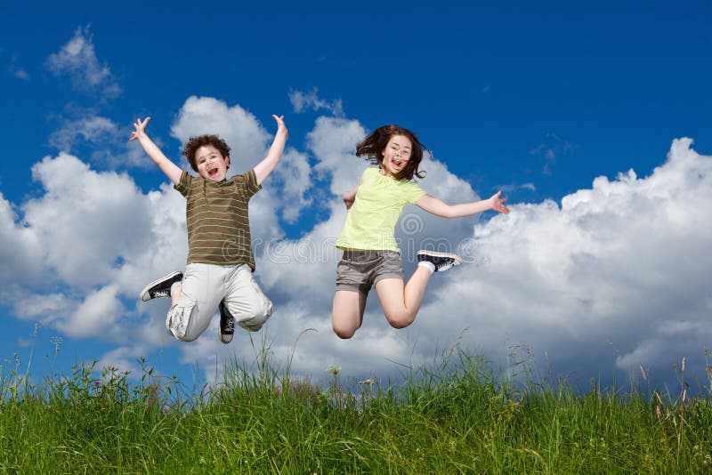 Kids jumping stock image. Image of boys, children, team - 6162965