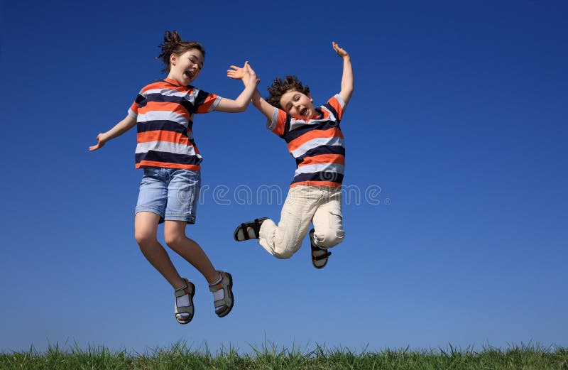 Kids jumping outdoor stock photo. Image of child, couple - 9088210