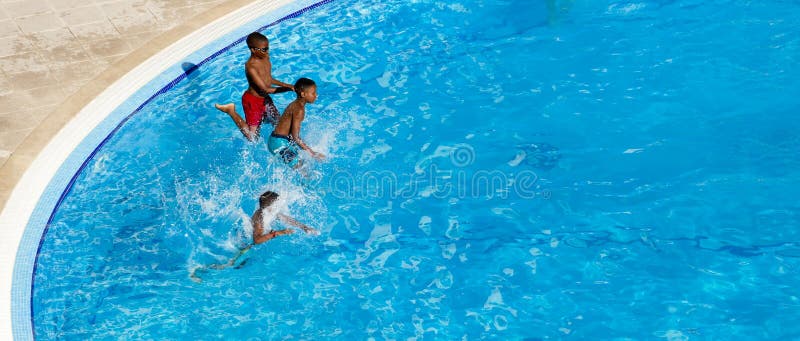 Boys and Girls Jumping into the Swimming Pool Stock Photo - Image of ...