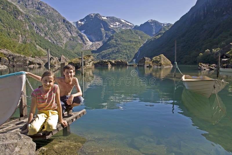 Kids at lake in Norway stock image. Image of enjoying - 7597705
