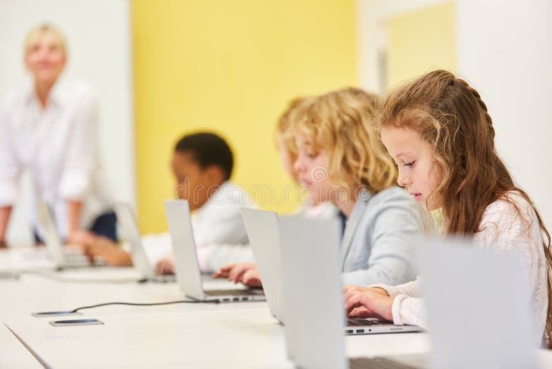 Kids at the Laptop in a Computer Class Stock Image - Image of primary ...