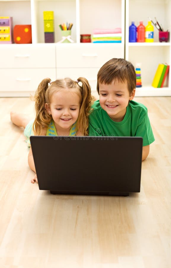 Kids with Laptop Laying on the Floor Stock Image - Image of little ...