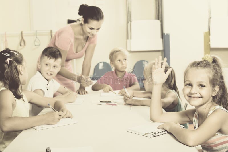 Kids Learning To Write on Lesson in Elementary School Class Stock Photo ...