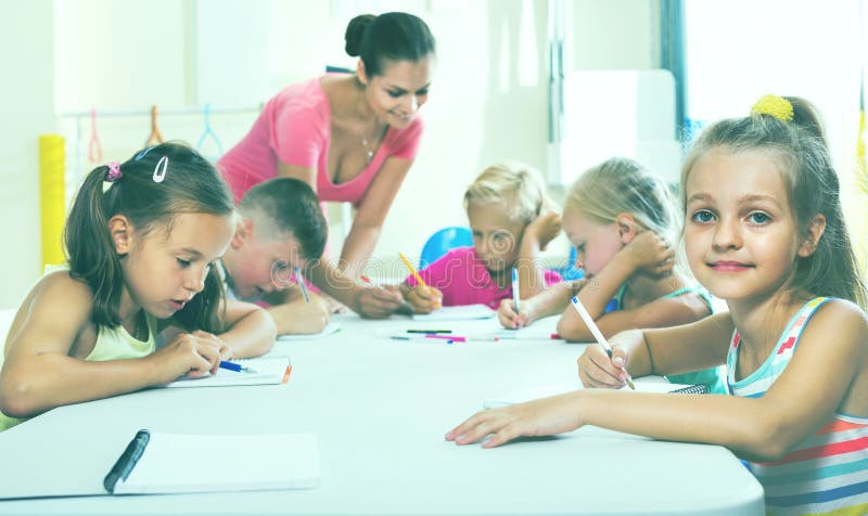 Kids Learning To Write on Lesson in Elementary School Class Stock Image ...