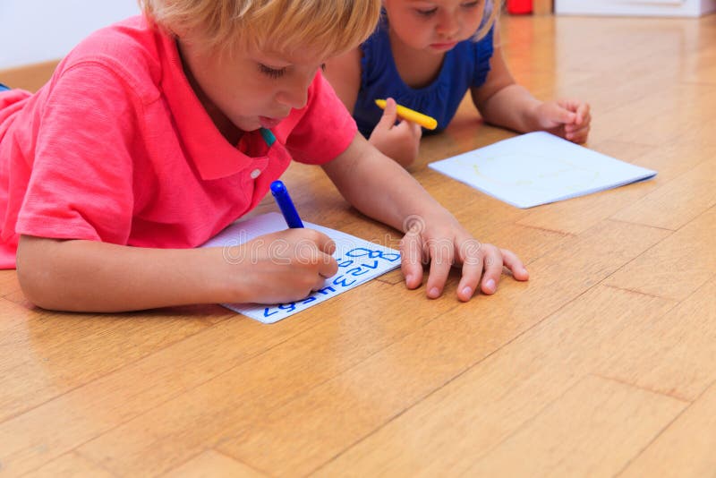 Boy and Girl Writing Numbers Stock Image - Image of home, math: 183520239