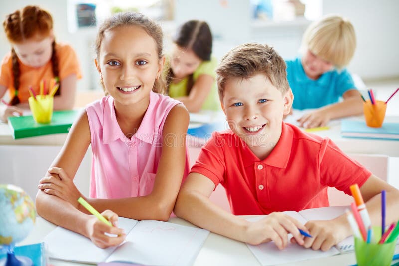 Kids at lesson stock image. Image of schoolchildren, junior - 60523009