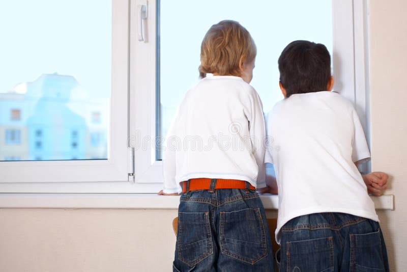Kids looking at window stock image. Image of depression - 13183947