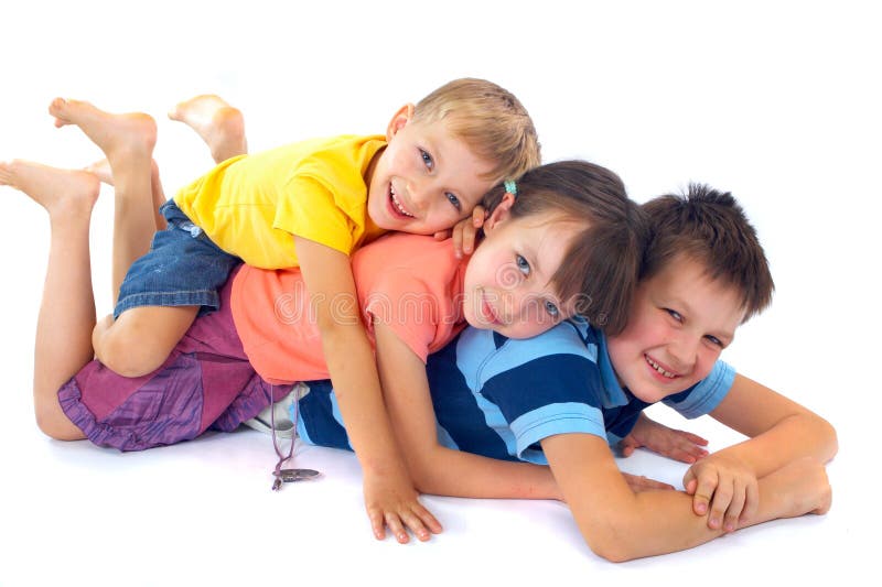 Kids lying on each other stock photo. Image of child, buddies - 3226062
