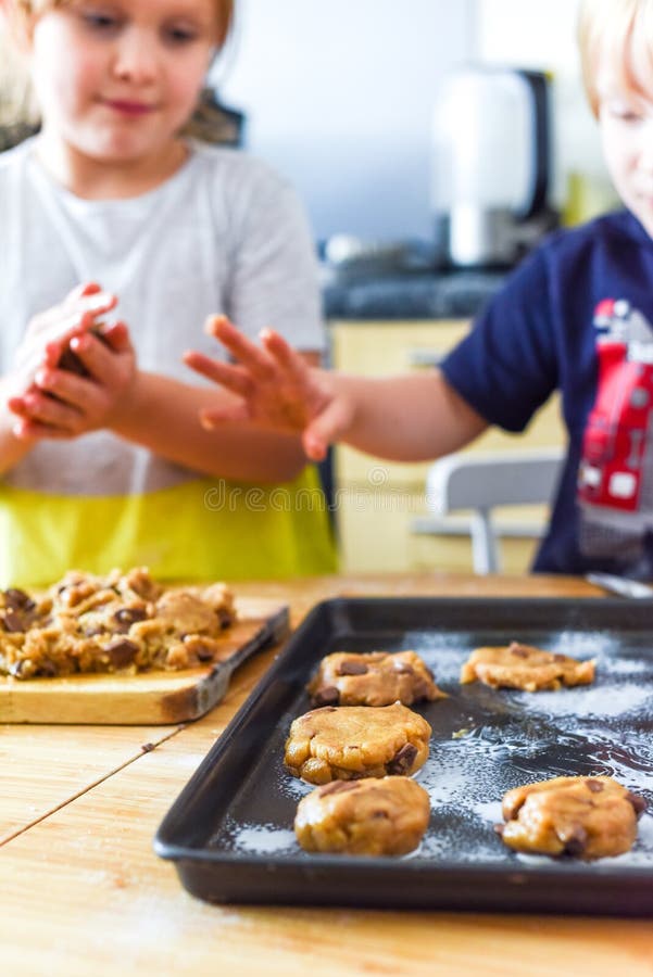 Kids Making Cookies in Kitchen Placing Dough on Tray for Cooking at ...