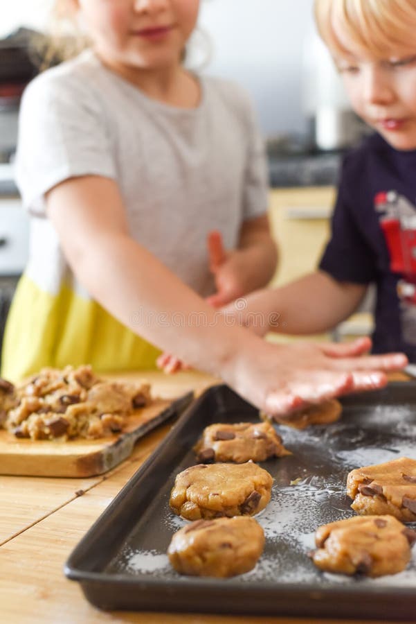 Kids Making Cookies in Kitchen Placing Dough on Tray for Cooking at ...