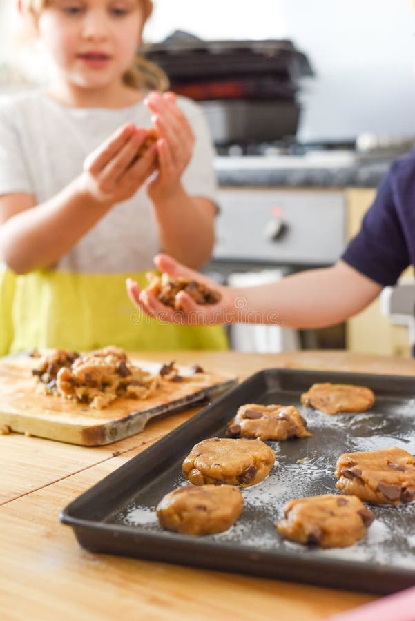 Kids Making Cookies in Kitchen Placing Dough on Tray for Cooking at ...