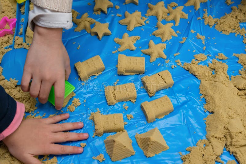 Kids Making Different Shapes by Sand with Mould Stock Photo - Image of ...