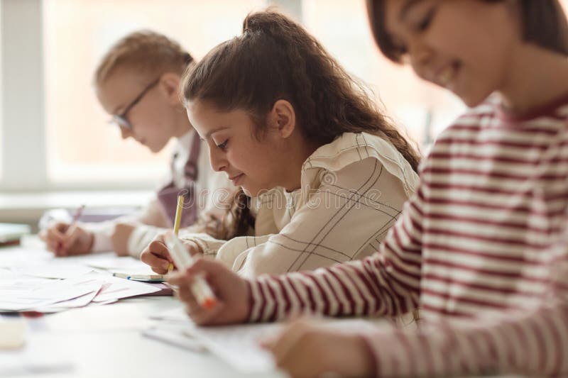 Kids Making Notes during Lesson Stock Photo - Image of routine ...