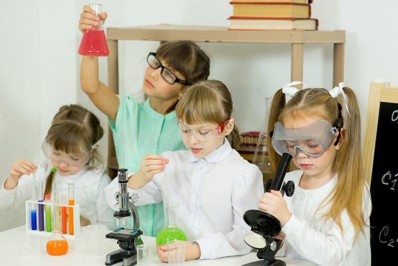 Kids Making Science Experiments Stock Photo - Image of girl, glass ...