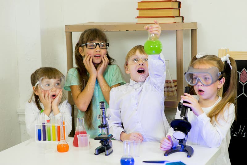 Kids Making Science Experiments Stock Photo - Image of microscope ...