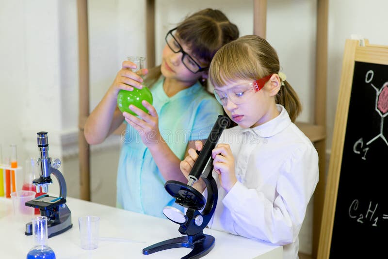 Kids Making Science Experiments Stock Image - Image of analyzing ...