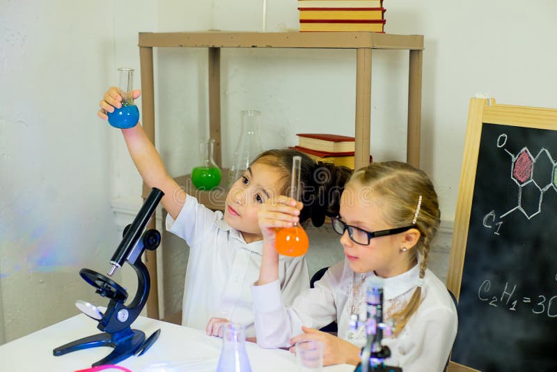 Kids Making Science Experiments Stock Photo - Image of learning, glass ...