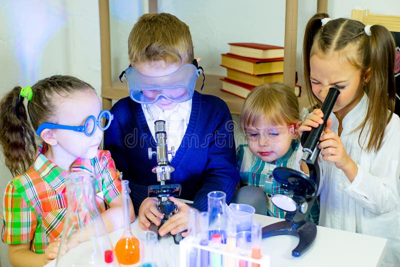 Kids Making Science Experiments Stock Photo - Image of explosion, glass ...